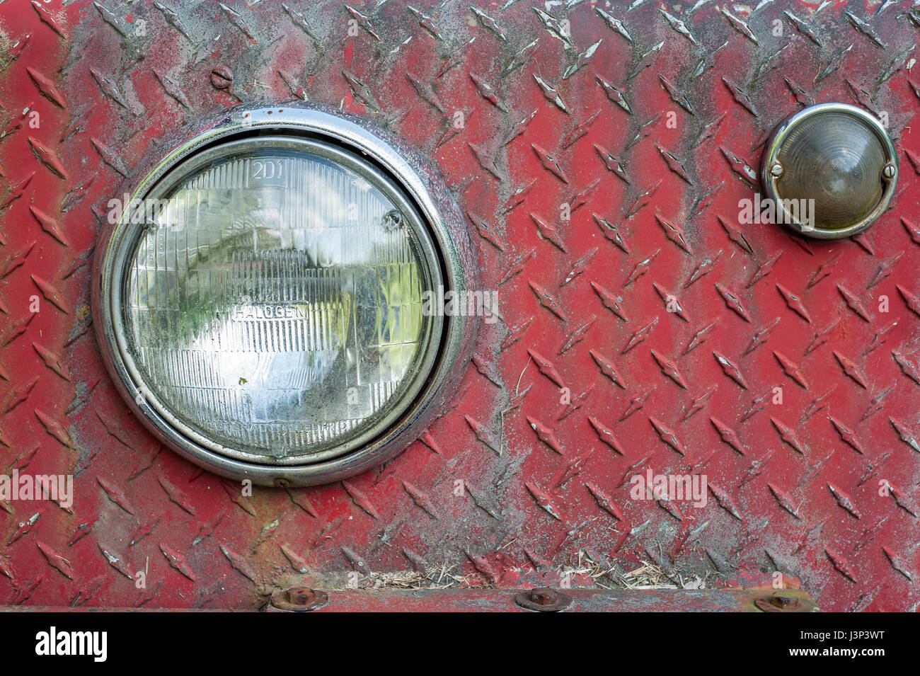 Headlights on rusted and weathered diamond plate sheet metal Stock ...