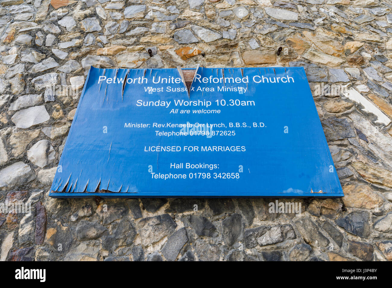 Neglected dilapidated name sign on exterior of Petworth United Reformed ...