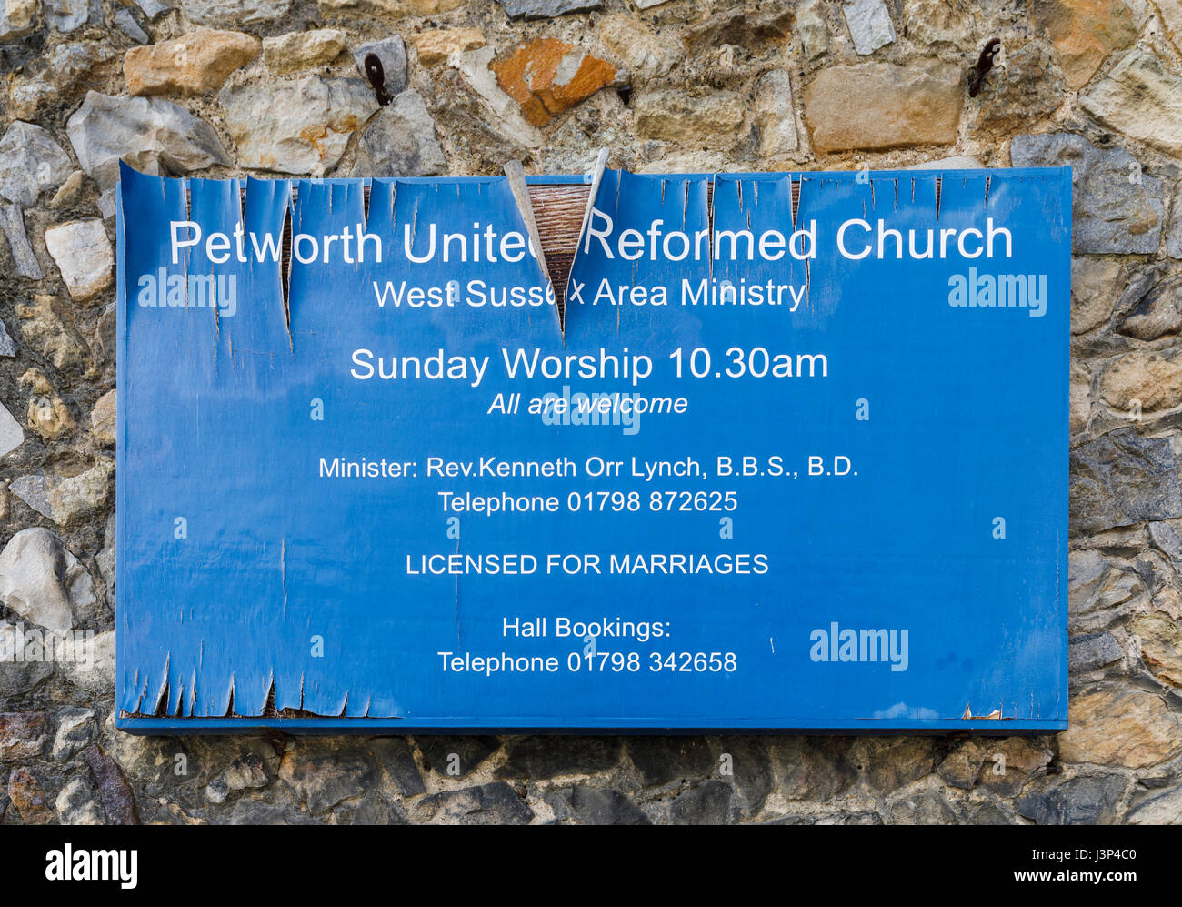 Neglected dilapidated name sign on exterior of Petworth United Reformed ...