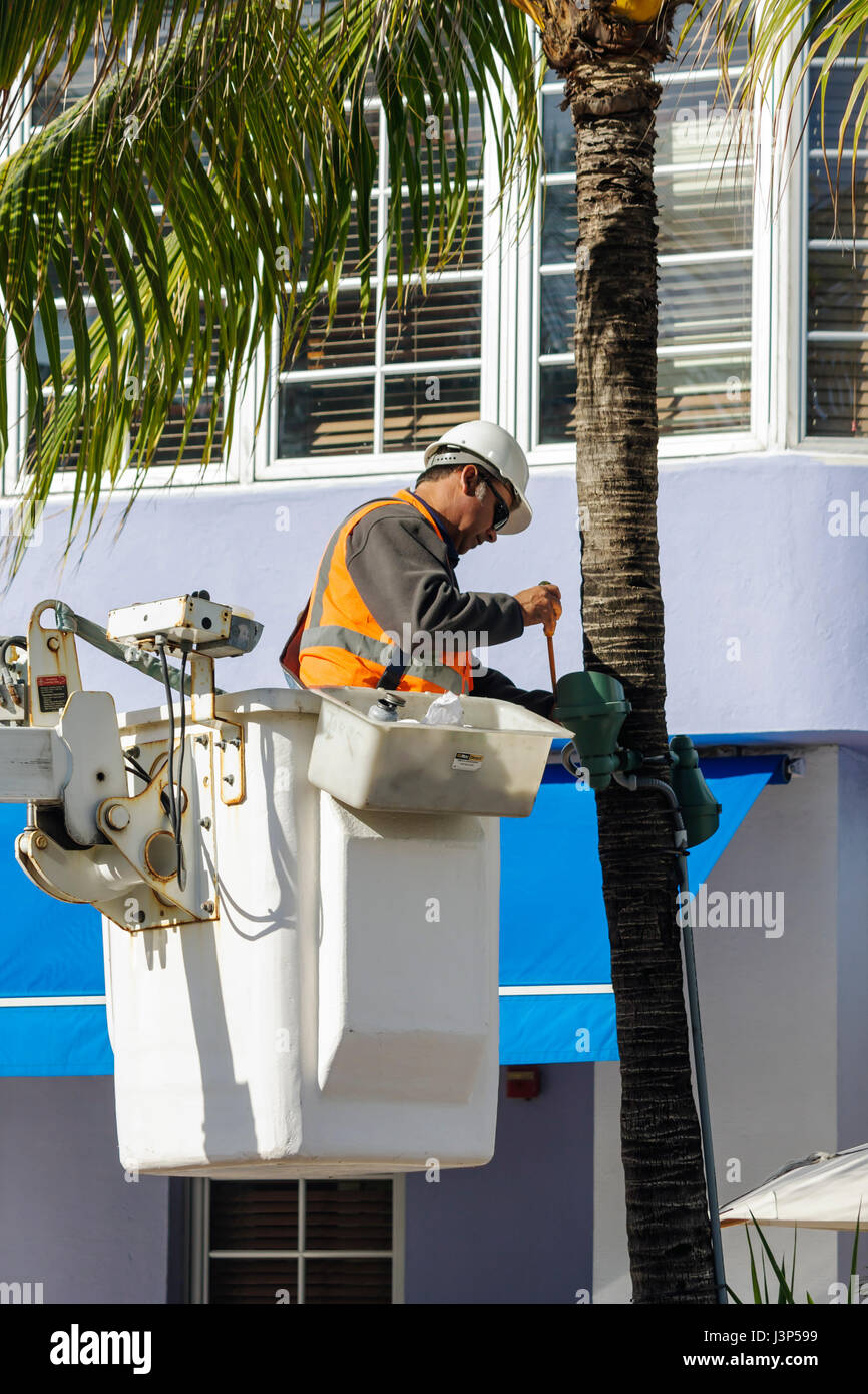 Miami Beach Florida,Ocean Drive,cherry picker,bucket,electrician,worker ...