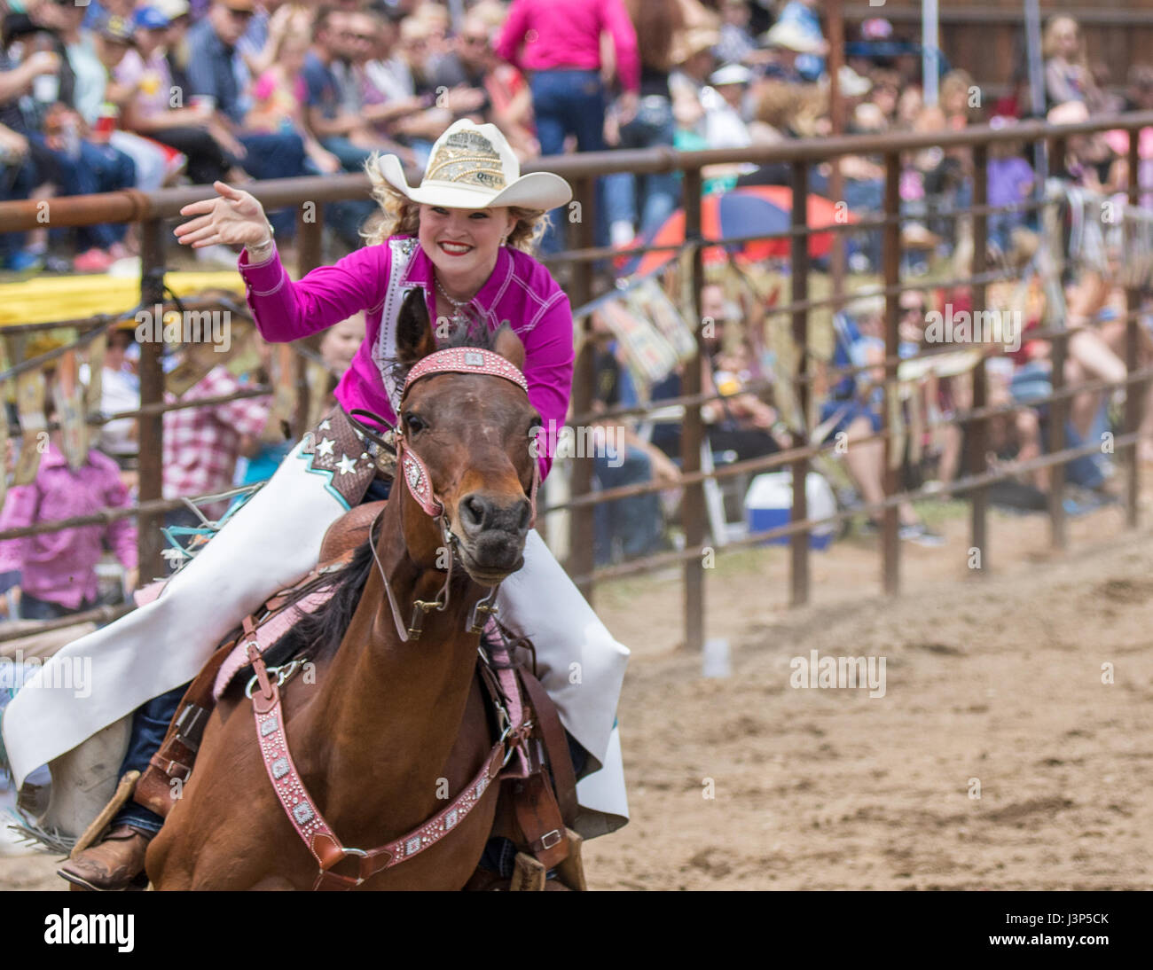 Rodeo cowgirls make an entrance at the Cottonwood Rodeo in northern ...