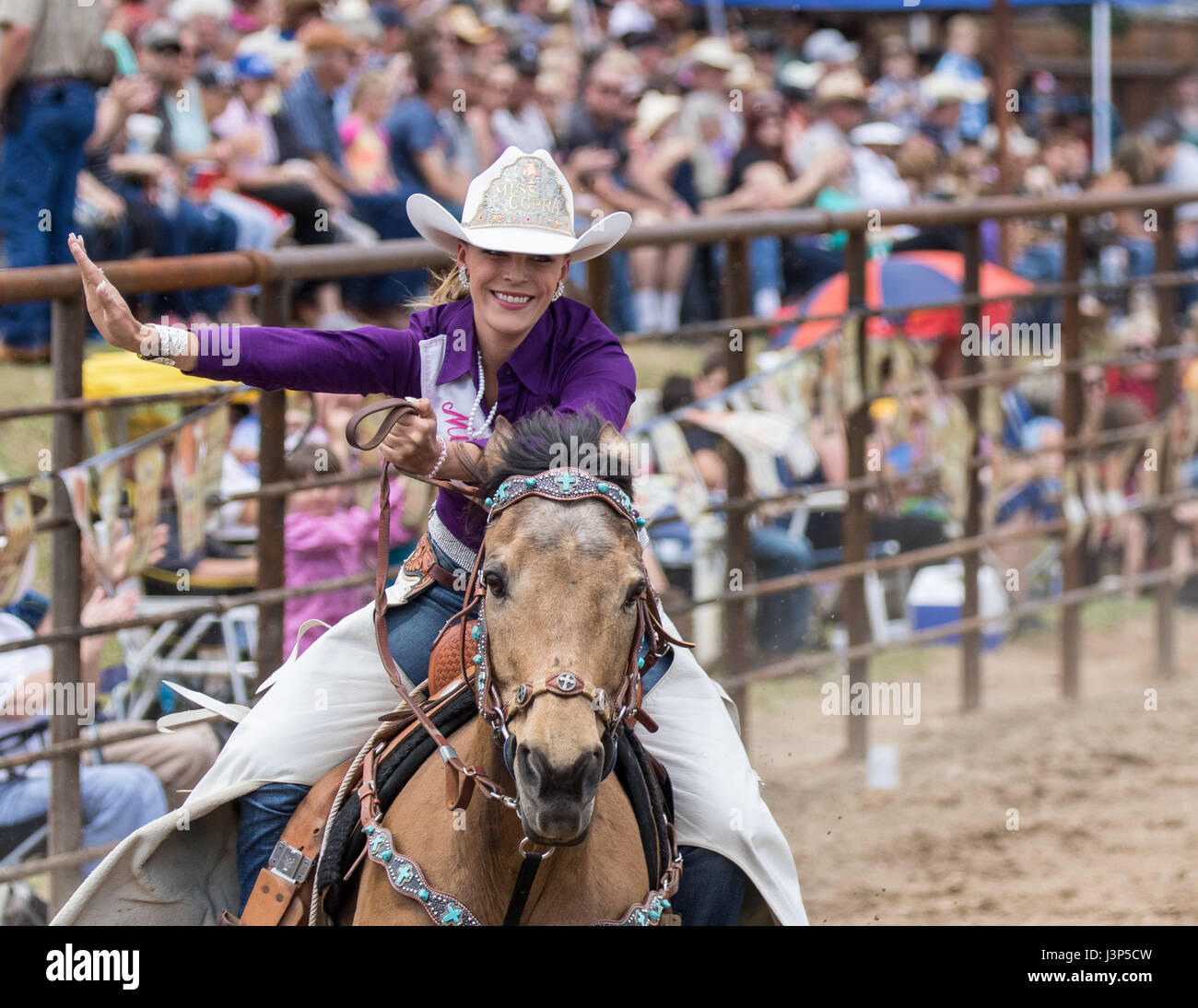 Rodeo cowgirls make an entrance at the Cottonwood Rodeo in northern ...