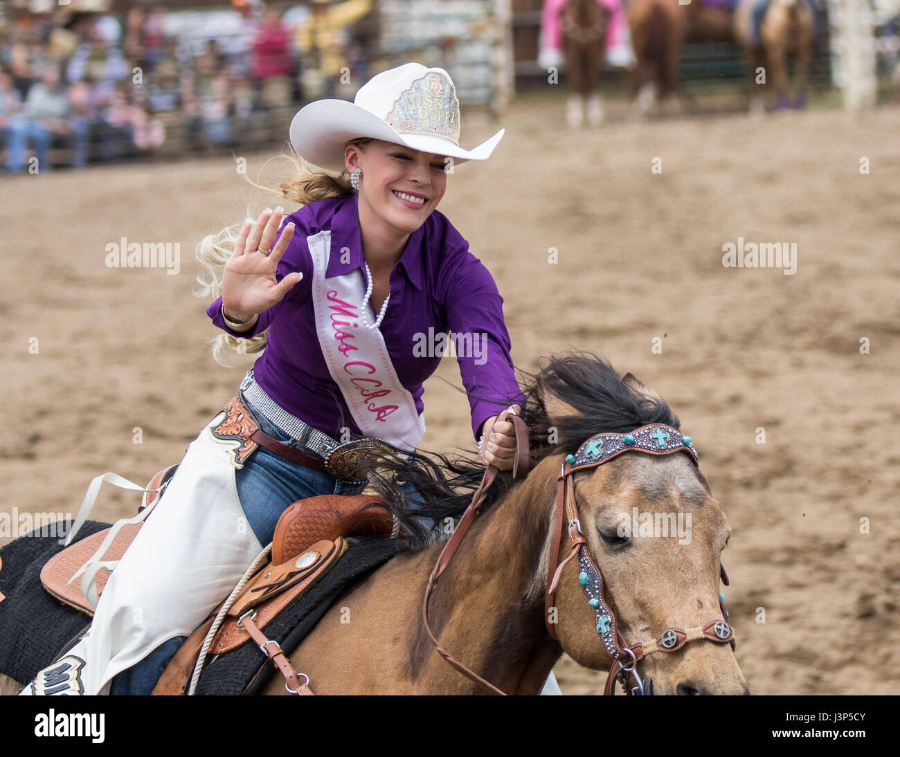 Rodeo cowgirls make an entrance at the Cottonwood Rodeo in northern ...