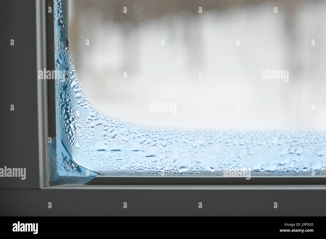 condensation and frost forming at the bottom of a window Stock Photo ...