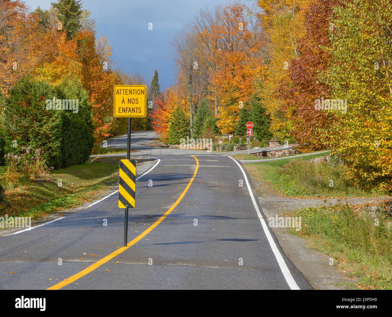 Sign in the middle of the road to slow down traffic on a country road ...