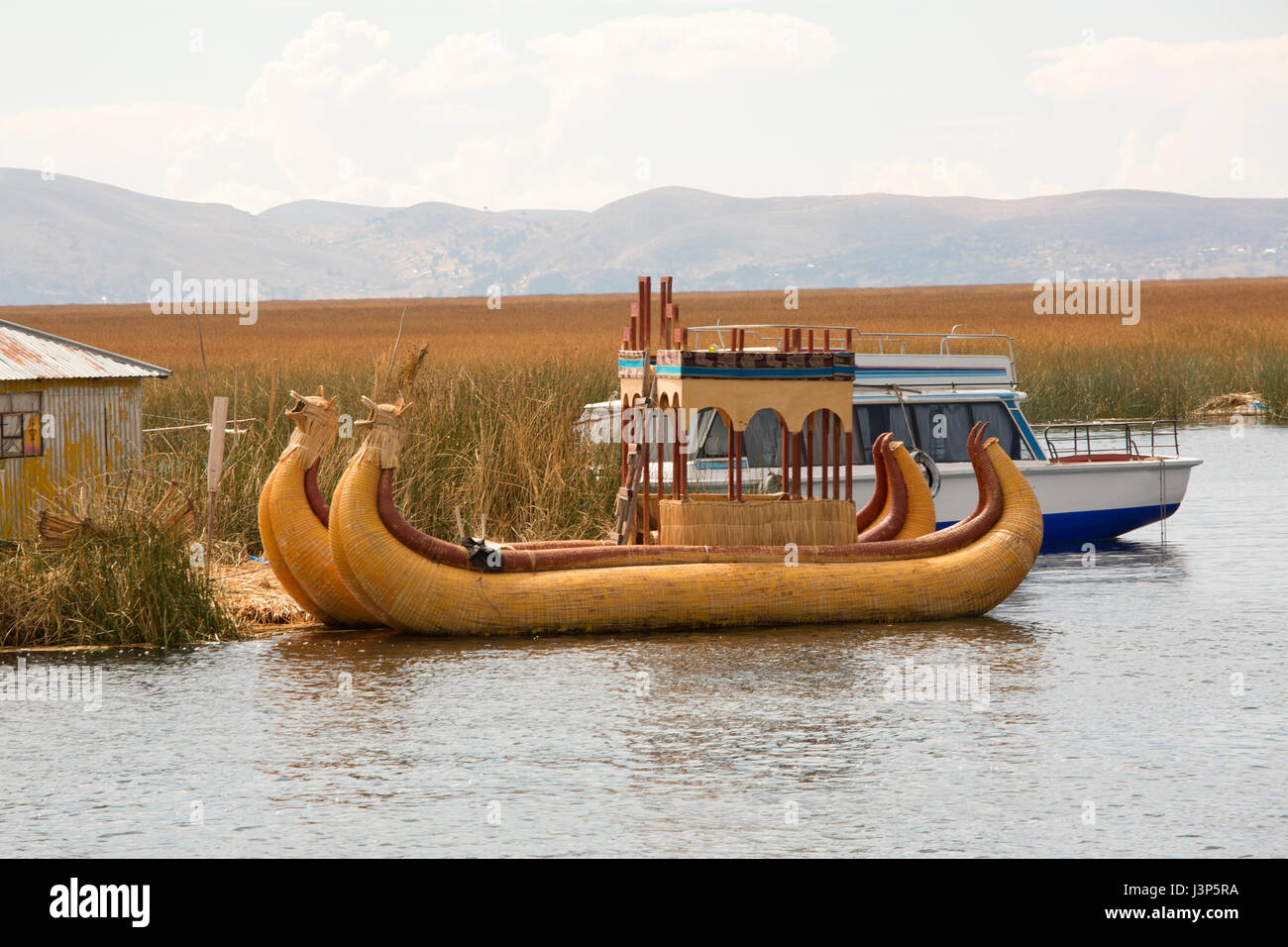 Los Uros artificial islands on Lake Titicaca, made of floating reeds ...