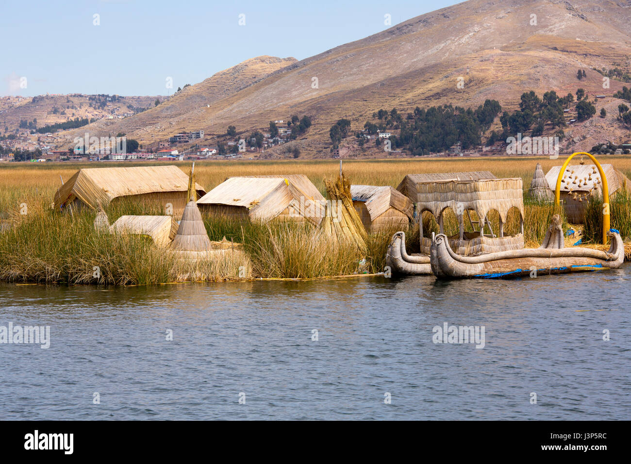 Los Uros artificial islands on Lake Titicaca, made of floating reeds ...