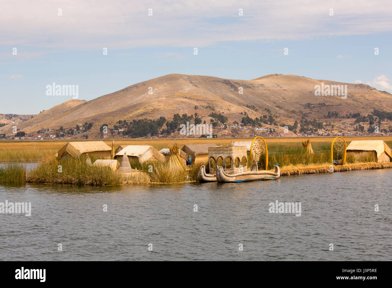 Los Uros artificial islands on Lake Titicaca, made of floating reeds ...