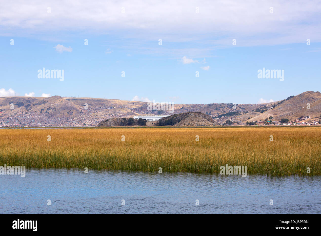 Los Uros artificial islands on Lake Titicaca, made of floating reeds ...