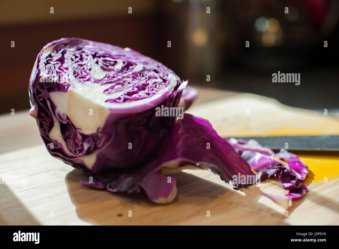 Red Cabbage on Cutting Board Stock Photo - Alamy