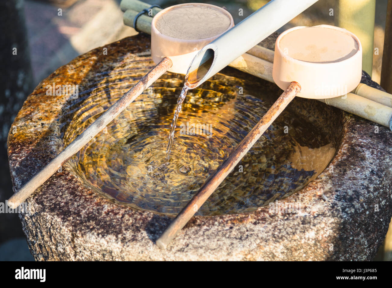 traditional Japanese stone water fountain Stock Photo - Alamy