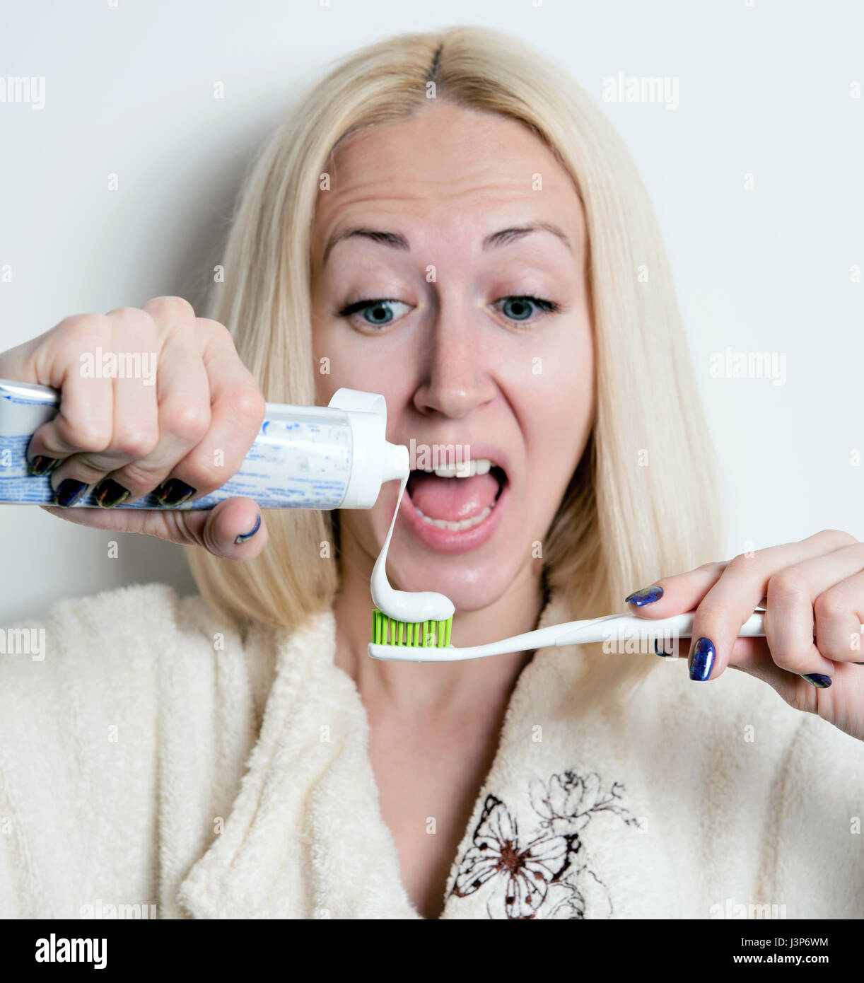 Squeezing toothpaste hi-res stock photography and images - Alamy