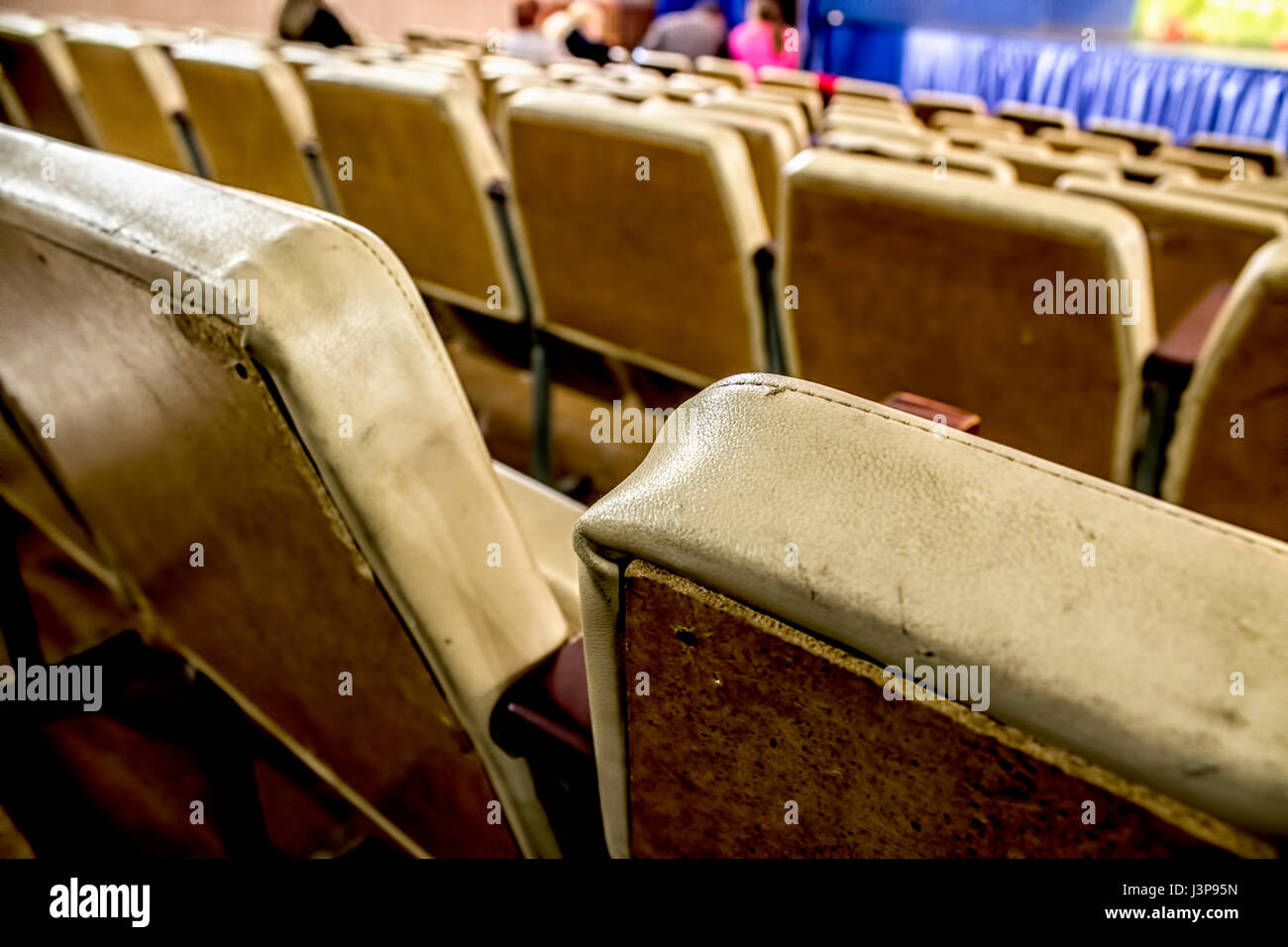 Empty leather yellow chairs of the old movie theater Stock Photo - Alamy