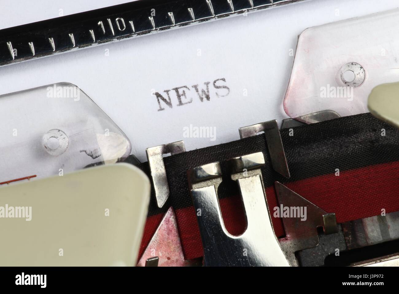 NEWS written with old typewriter Stock Photo - Alamy