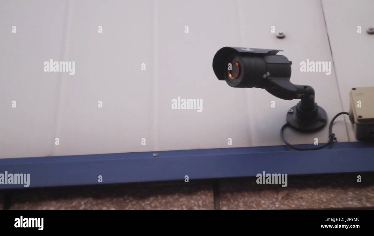 surveillance camera on the wall of the enterprise CCTV Stock Photo - Alamy