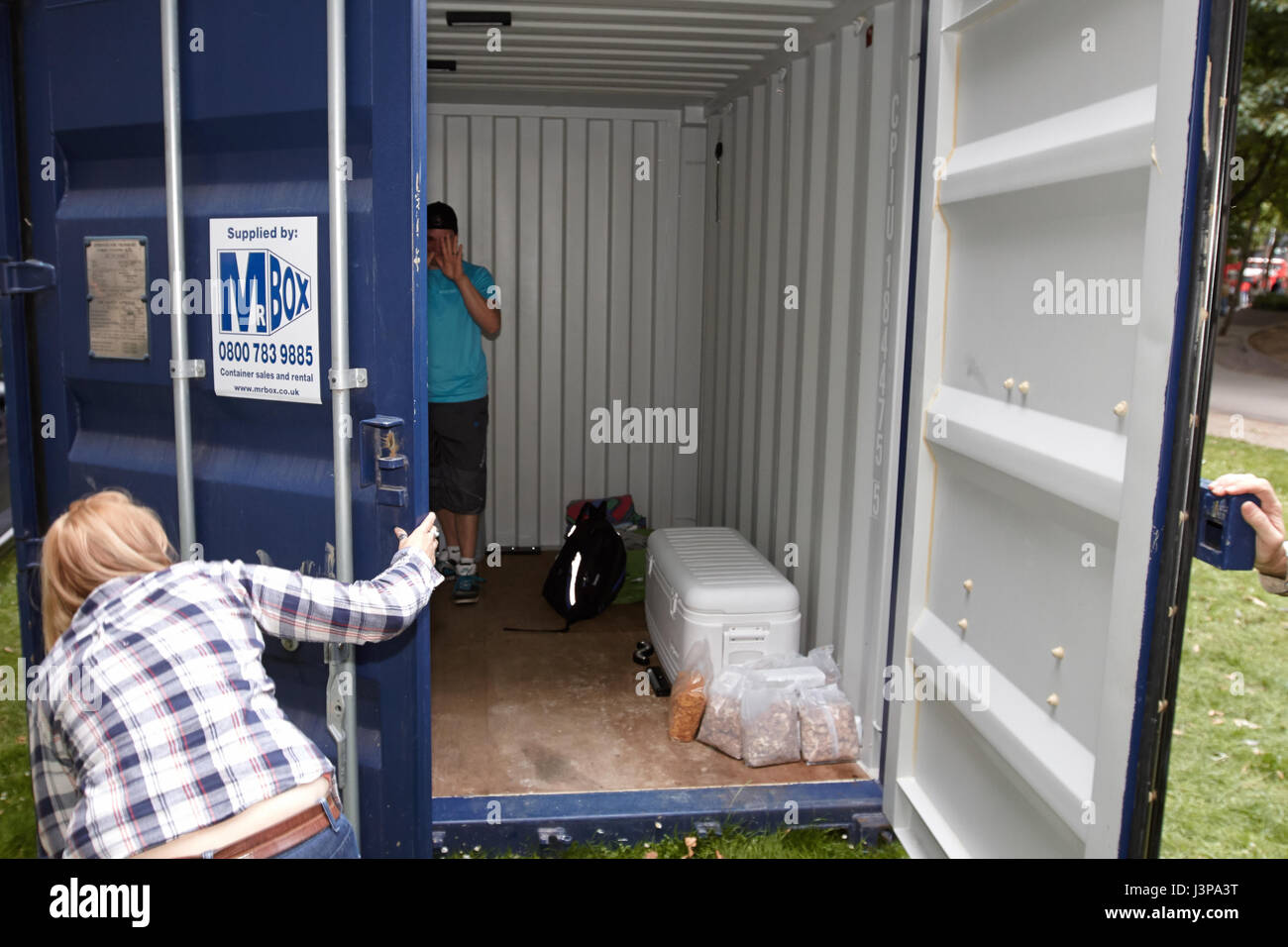 Campaigner Phil Knight enters a 10 x 8 shipping container in Euston ...