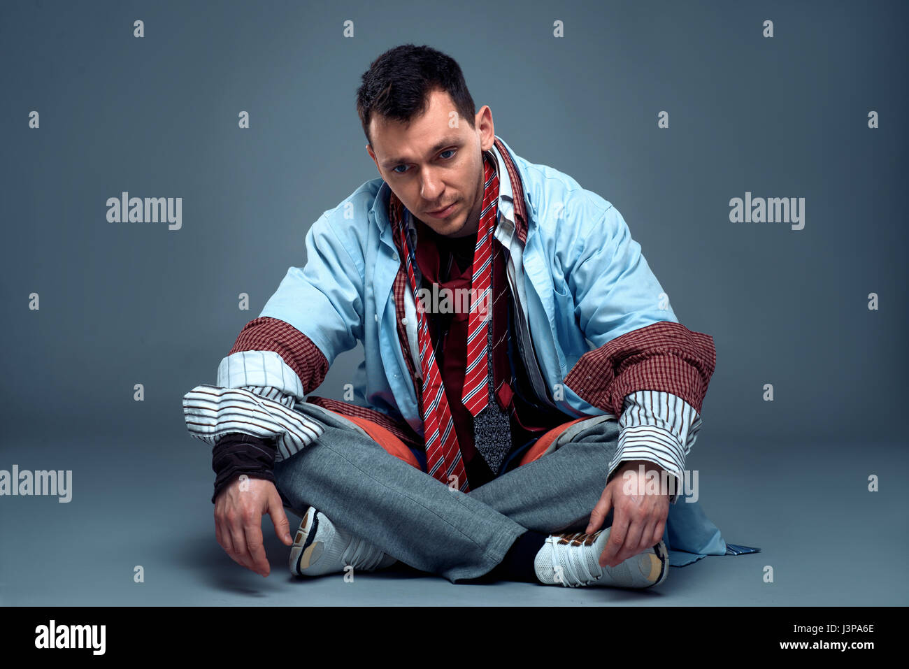 Tired male consumer after clothes sale. Shopping concept. Doomed man ...