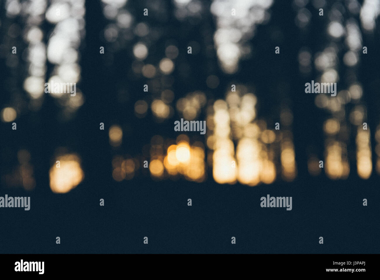 orange festive blur background with beautiful boke effect - grainy ...