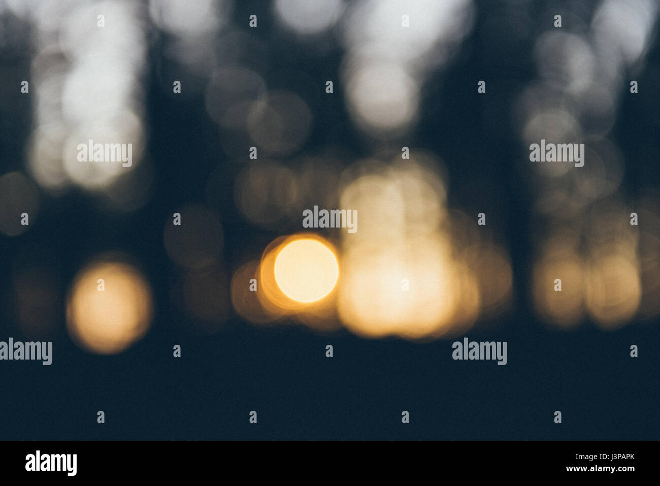 orange festive blur background with beautiful boke effect - grainy ...