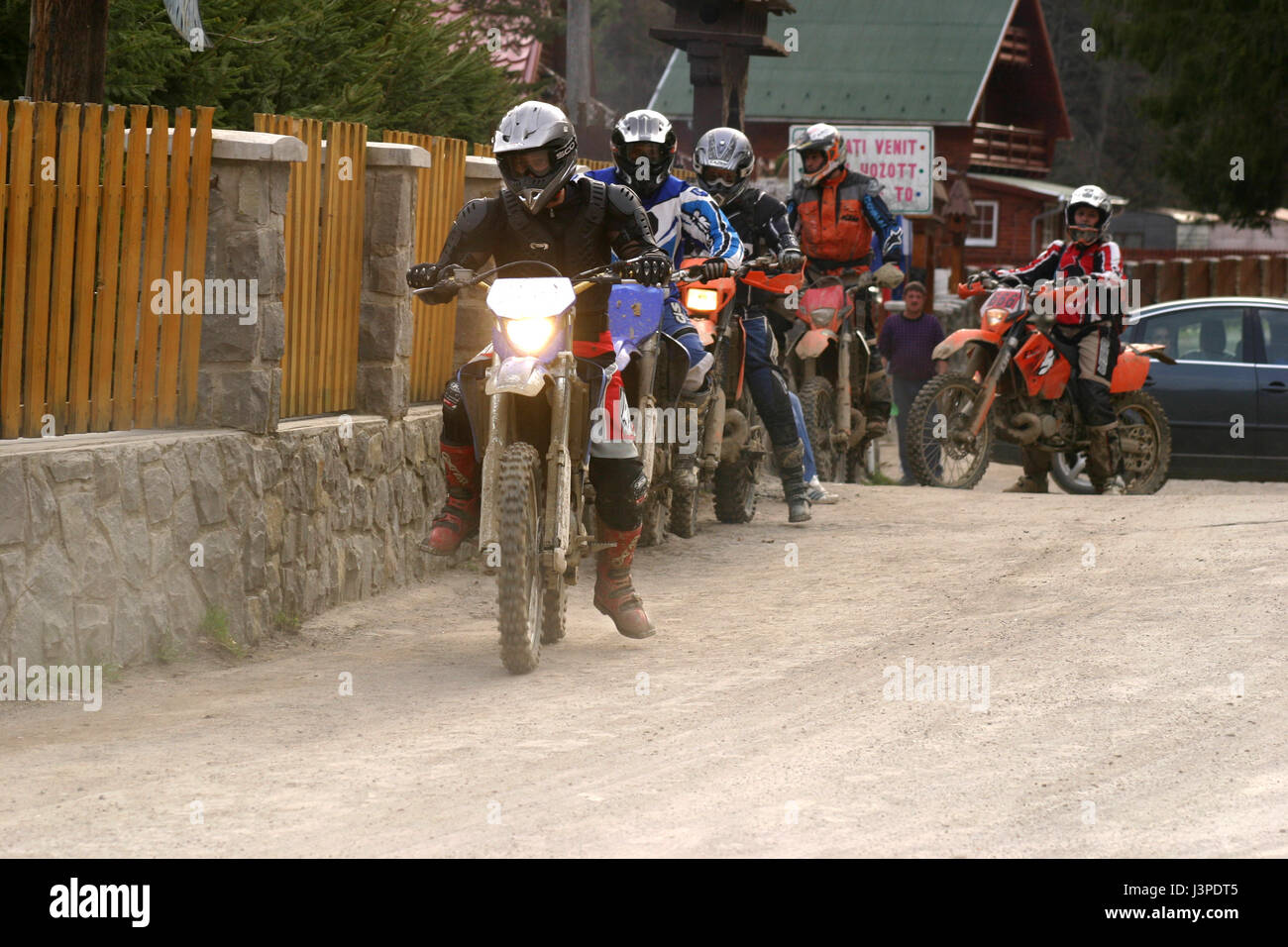 Motorcyclists on cross country competition Stock Photo - Alamy