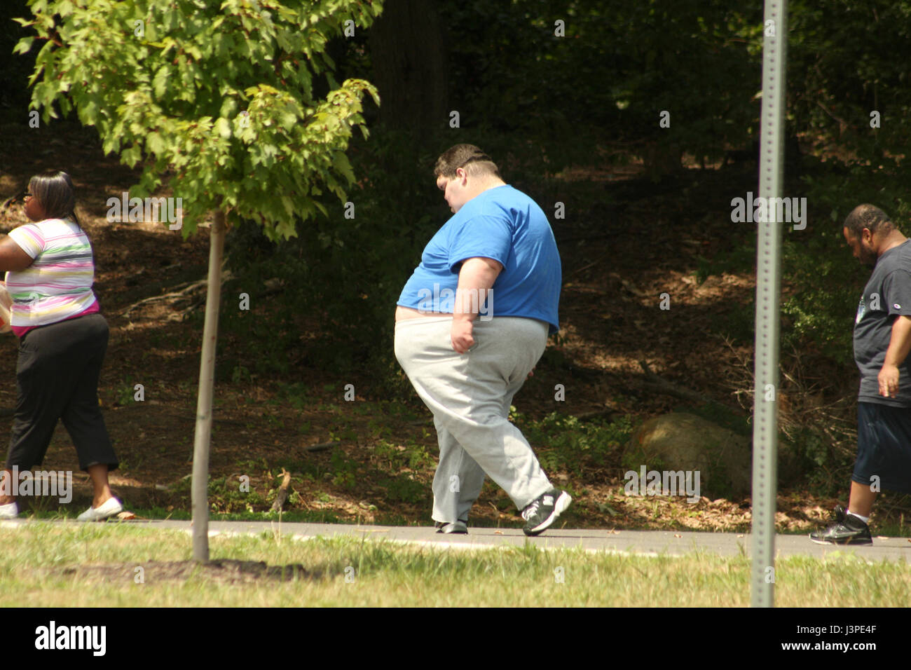 Fat man walking hi-res stock photography and images - Alamy