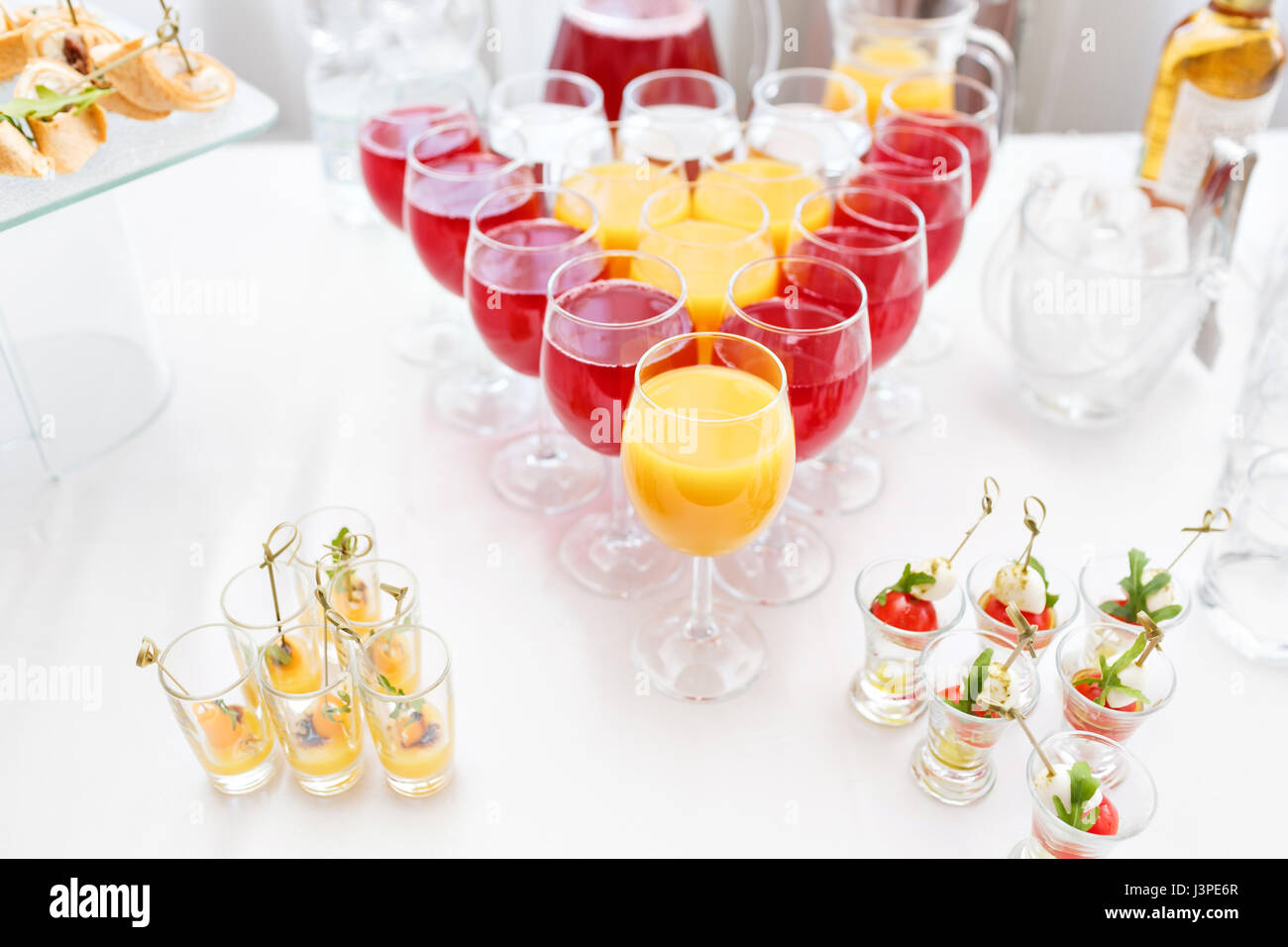 Restaurant Cocktail Tables in the Cocktail party. ice in a transparent ...
