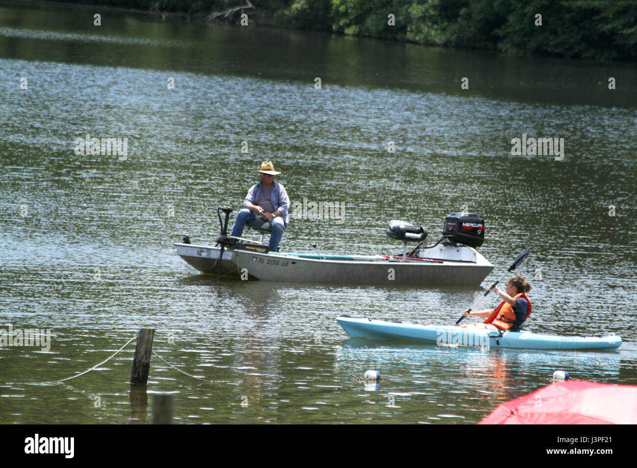 Fishing from a boat Stock Photo - Alamy