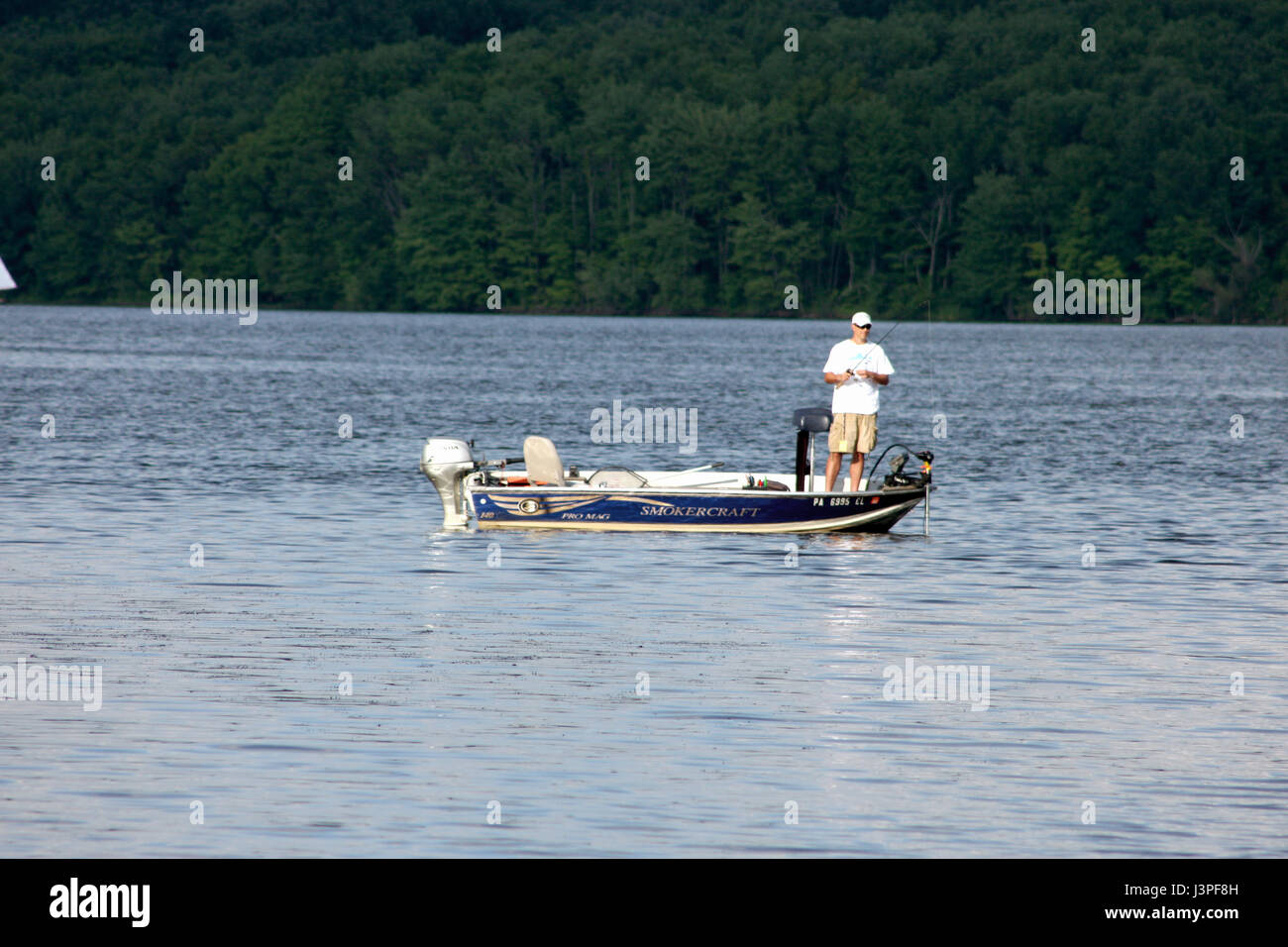 Fishing from a boat Stock Photo - Alamy