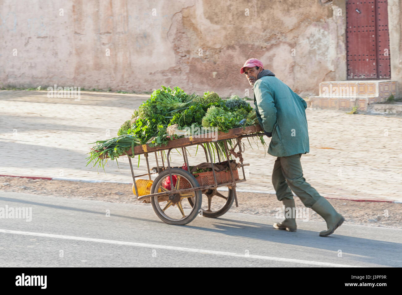 MEKNES, MOROCCO - FEBRUARY 18, 2017: Unidentified man walking in the ...