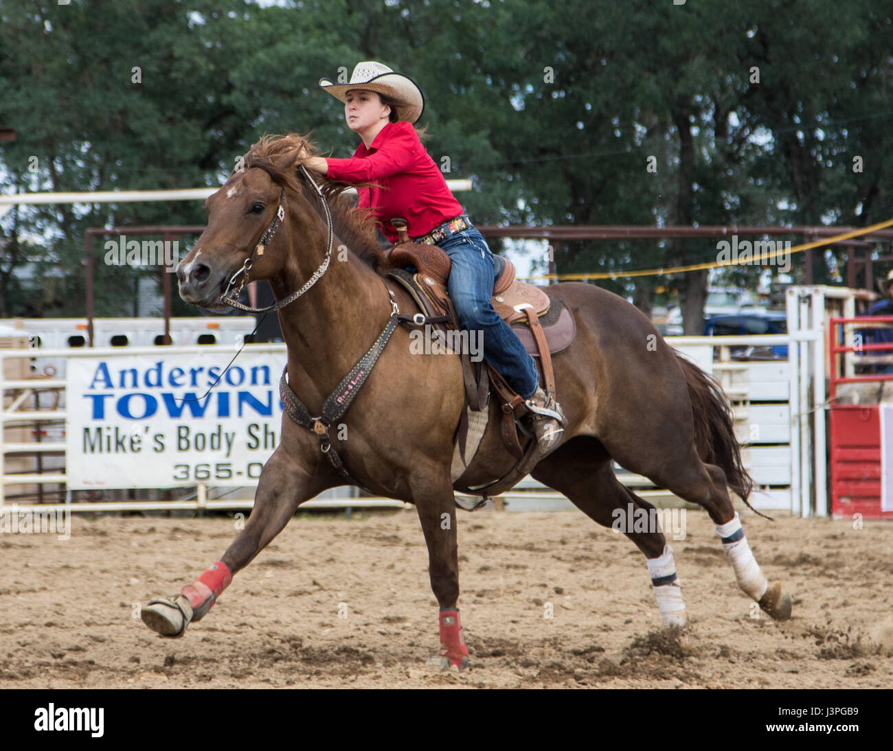 Barrel racing action at the rodeo in Cottonwood, California Stock Photo ...