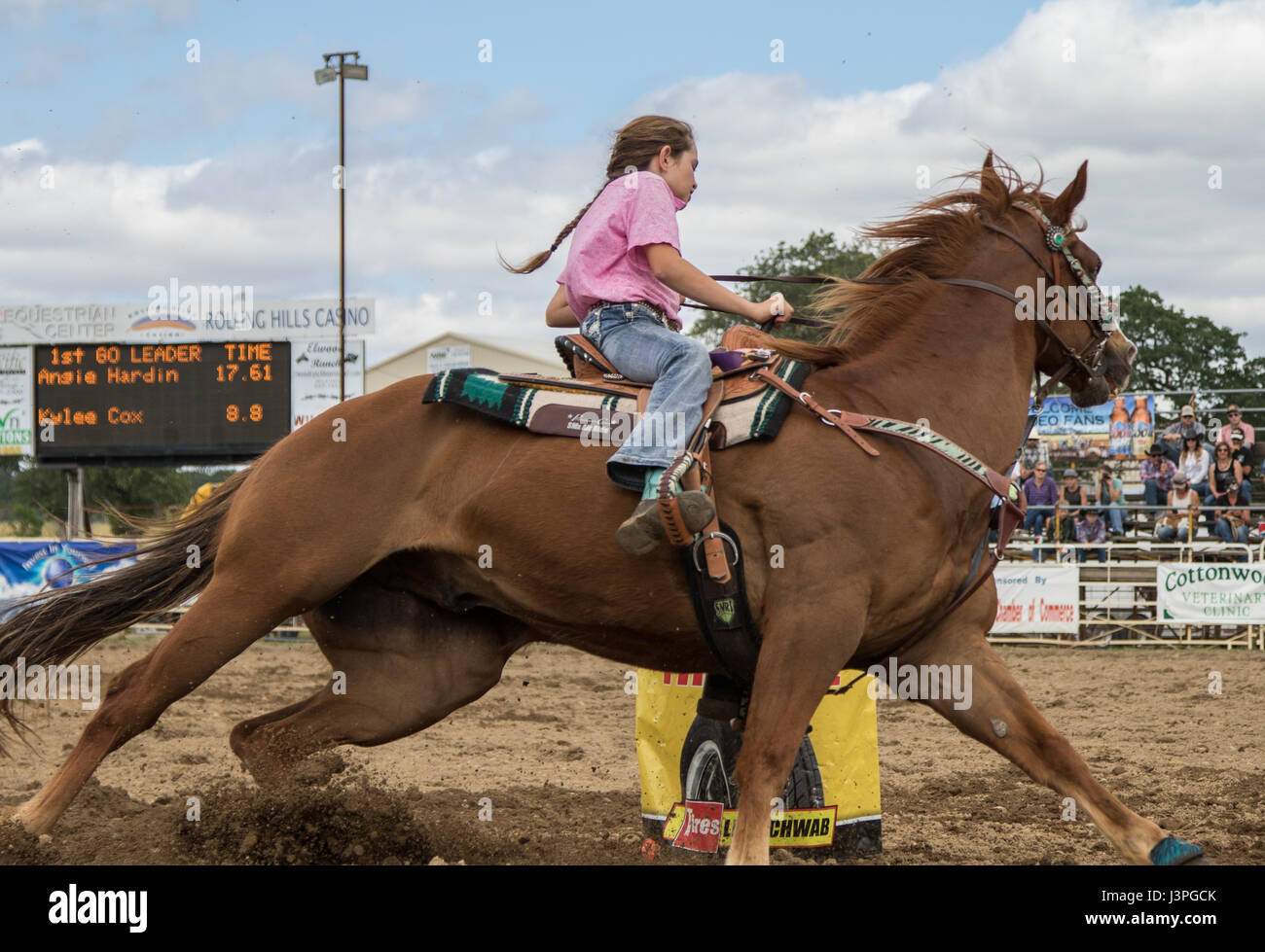 Barrel racing action at the rodeo in Cottonwood, California Stock Photo ...