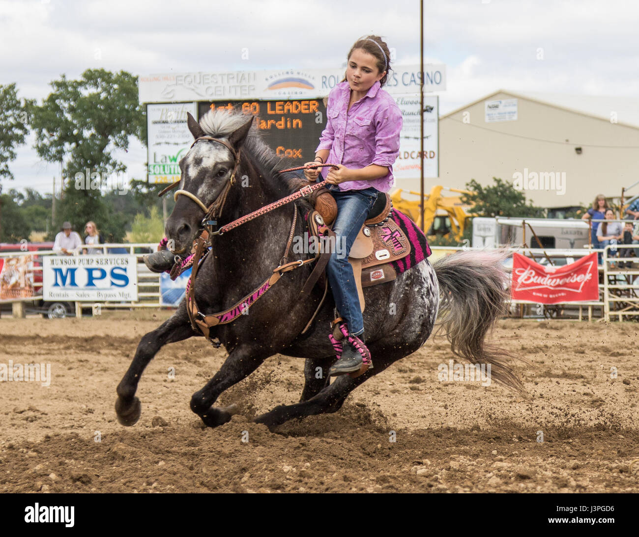 Barrel racing cowgirls in action hi-res stock photography and images ...