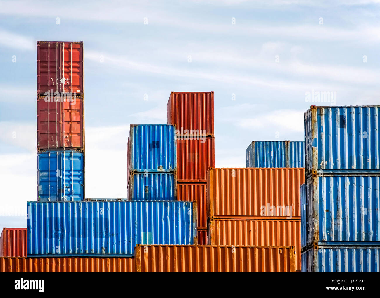 Stack of Cargo Containers in an intermodal yard with blue sky Stock ...