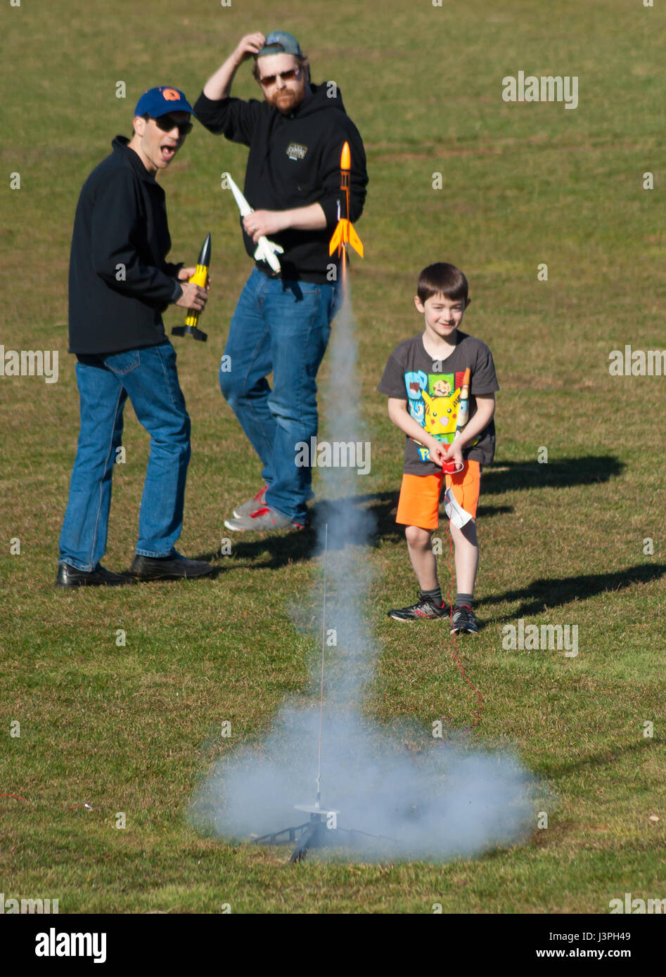 Boy launching a model rocket at Millennium Park, Boston Stock Photo - Alamy