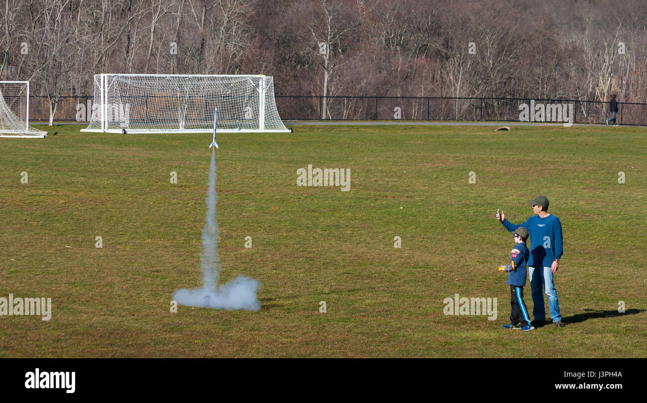 Cub Scout launching a model rocket at Millennium Park, Boston Stock ...