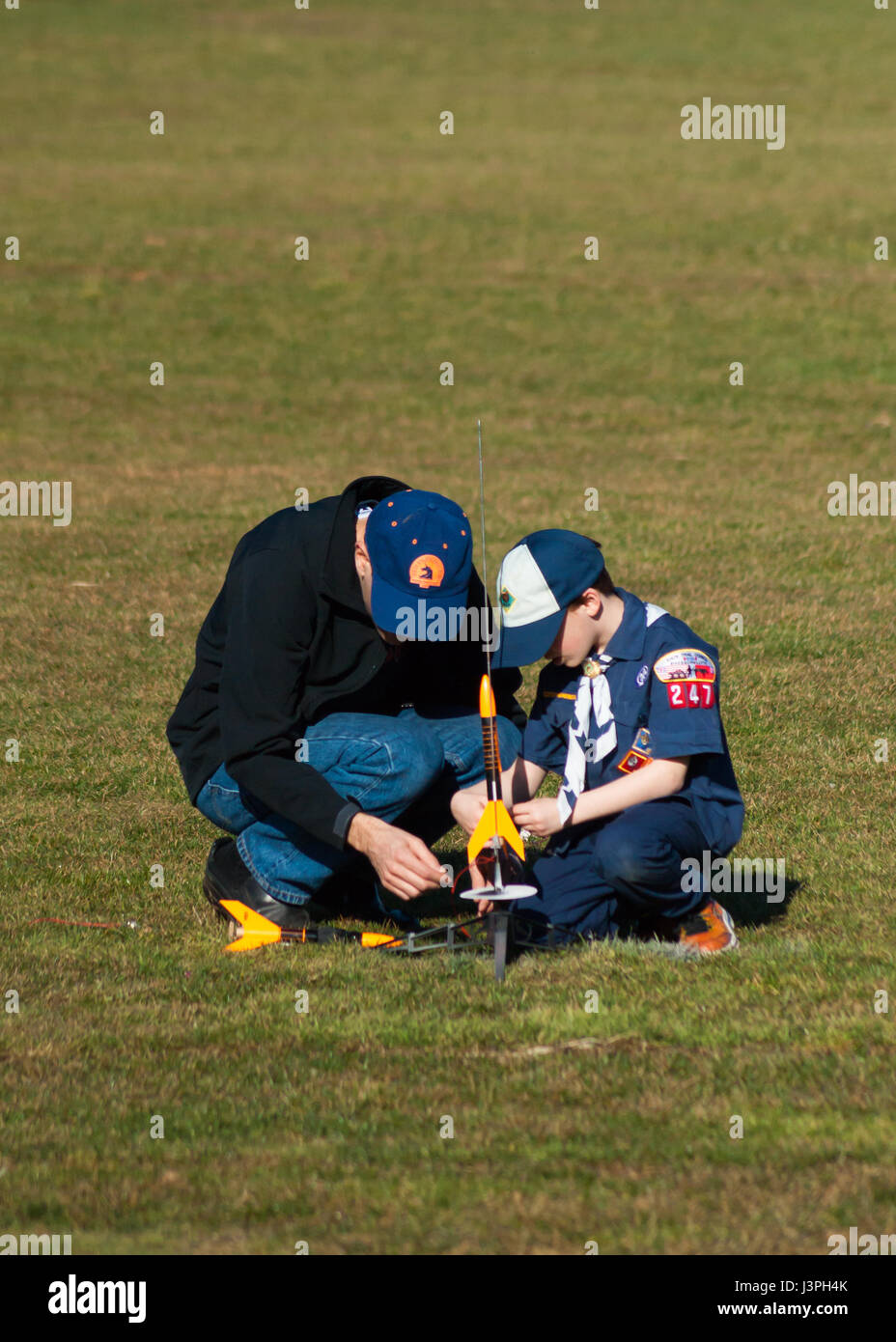 Cub Scout preparing a model rocket for launch at Millennium Park ...