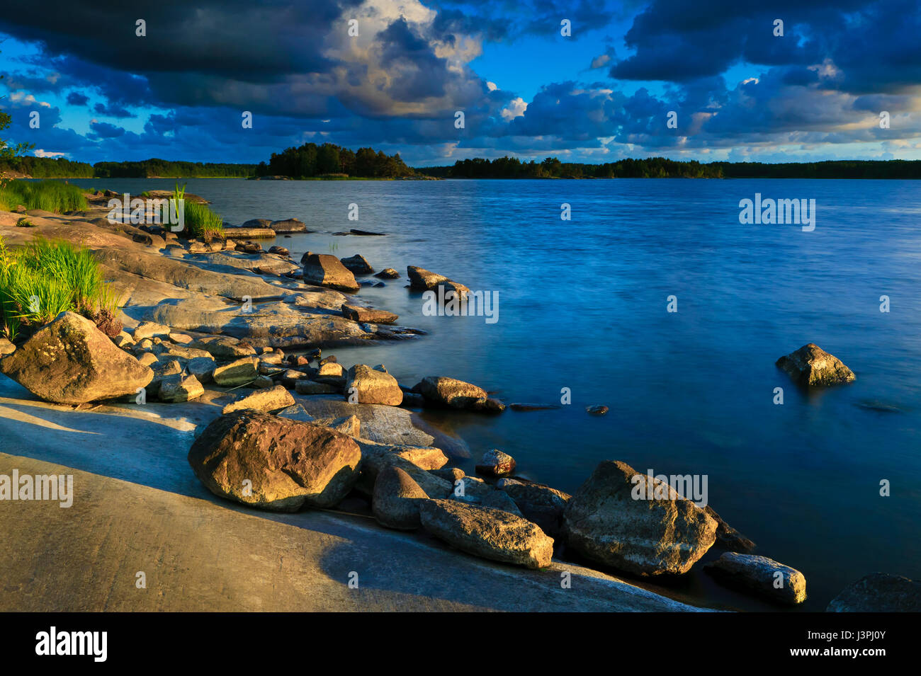 Summer evening at the island Brattholmen in the lake Vansjø, Østfold ...