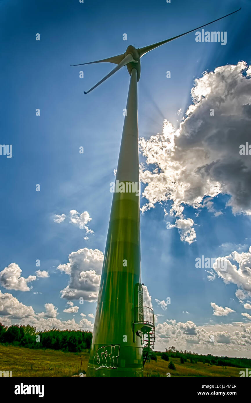 Wind turbine with sun beams HDR Stock Photo - Alamy