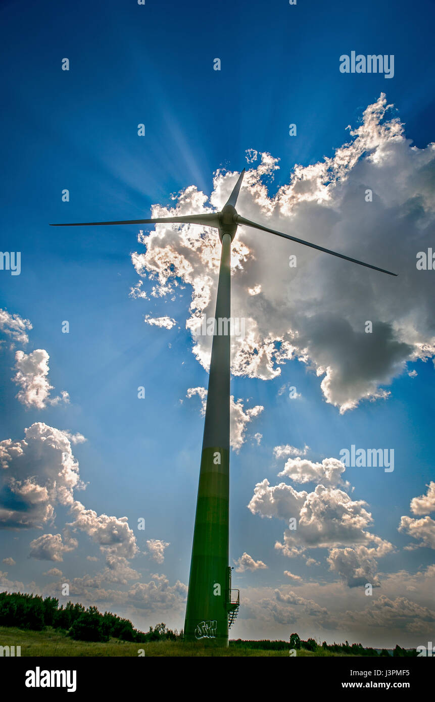 Wind turbine with sun beams HDR Stock Photo - Alamy