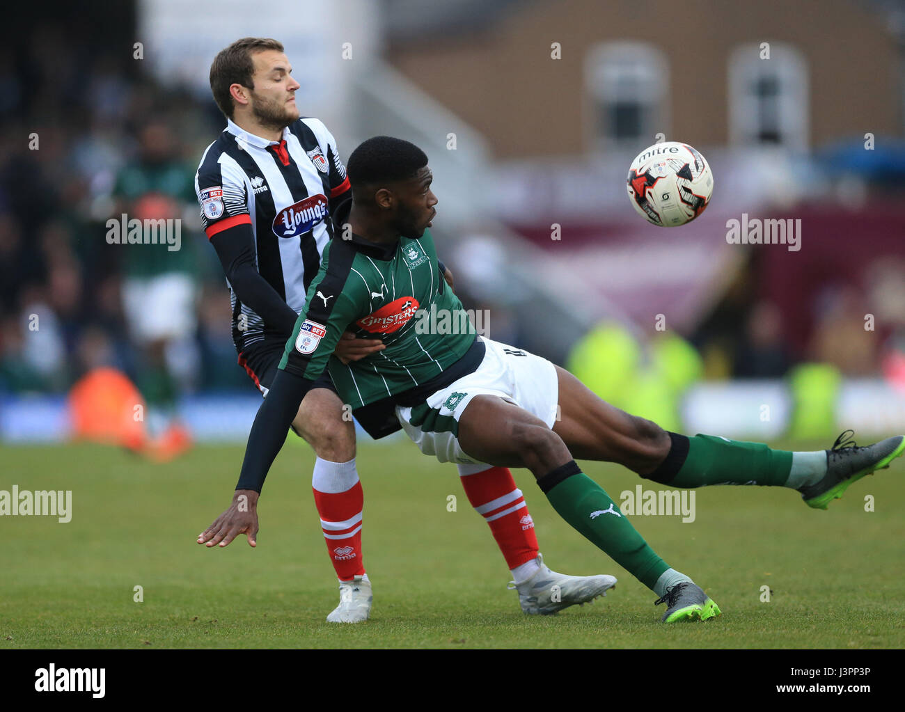 Grimsby Town's Jamie Osborne and Plymouth Argyle's Nathan Blissett ...