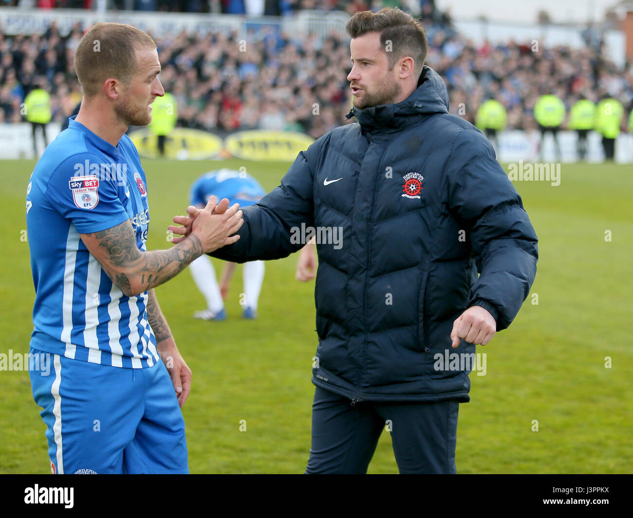 Hartlepool's Lewis Alessandra is consoled by Hartlepool United manager ...