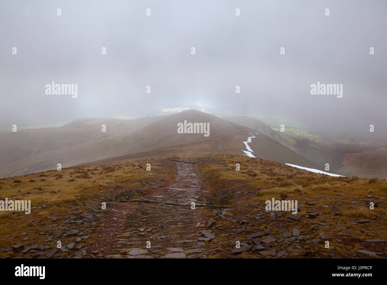Looking down Cefn Cwm Llwch ridge, descending from Pen Y Fan, on a ...