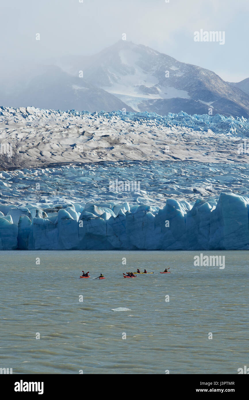 Group of people kayaking on Lago Grey in Torres del Paine National Park ...