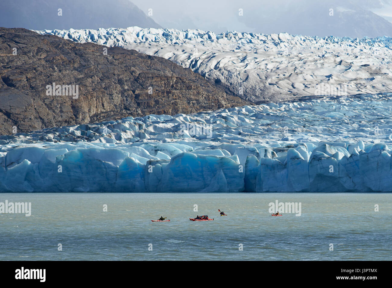 Group of people kayaking on Lago Grey in Torres del Paine National Park ...