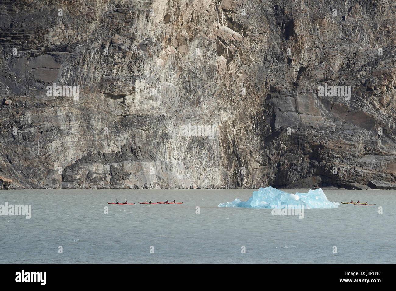 Group of people kayaking on Lago Grey in Torres del Paine National Park ...