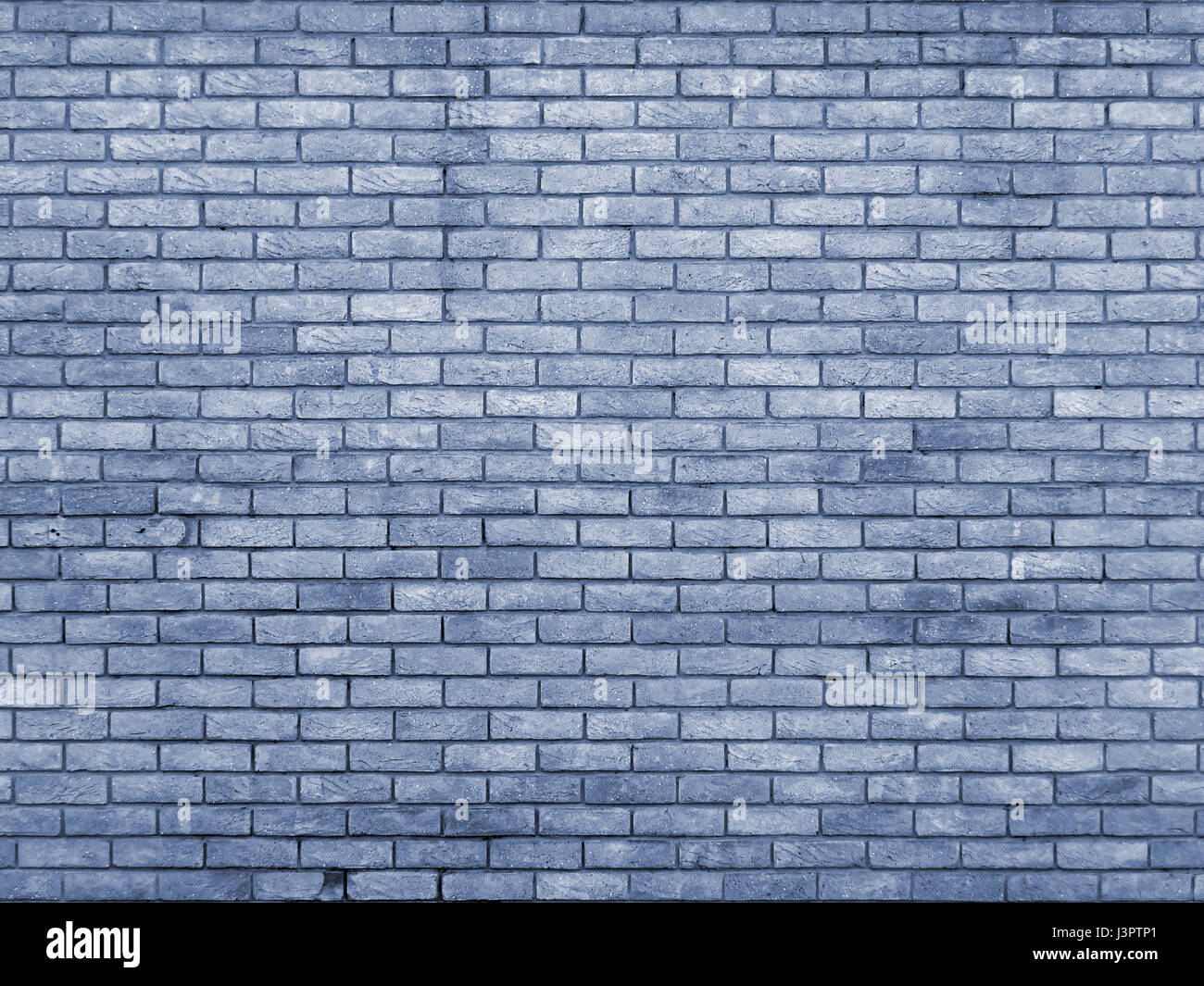 blue toned brick wall with repeating pattern Stock Photo - Alamy