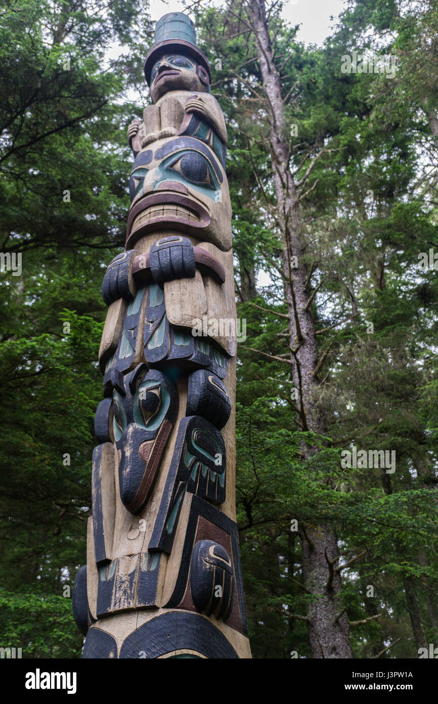 Totem poles in Alaska Stock Photo - Alamy