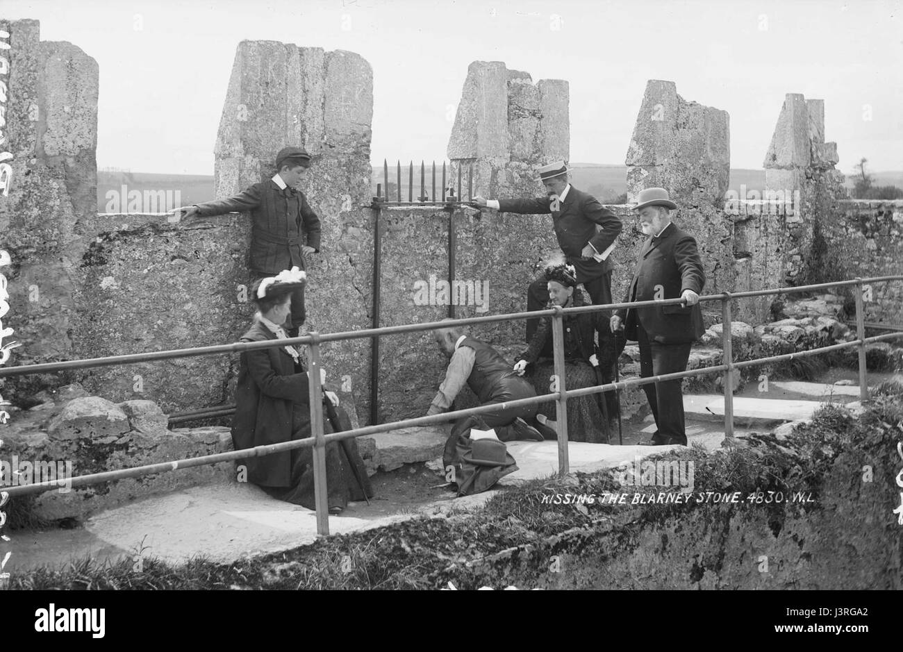 Kissing the Blarney Stone 1897 Stock Photo - Alamy