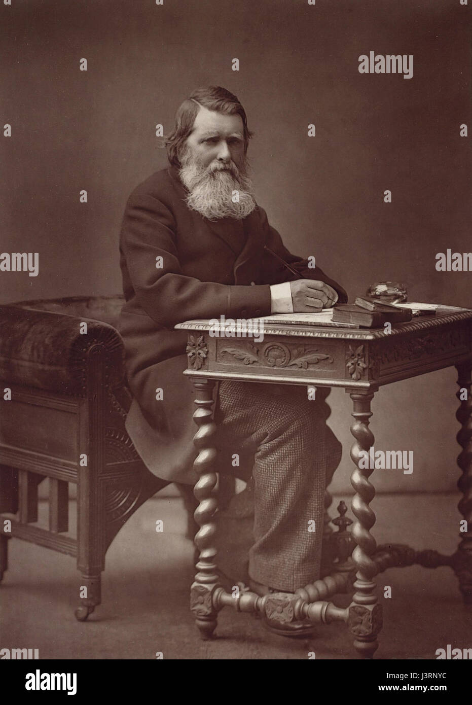 John Ruskin, by Herbert Rose Barraud, 1882, seated Stock Photo - Alamy