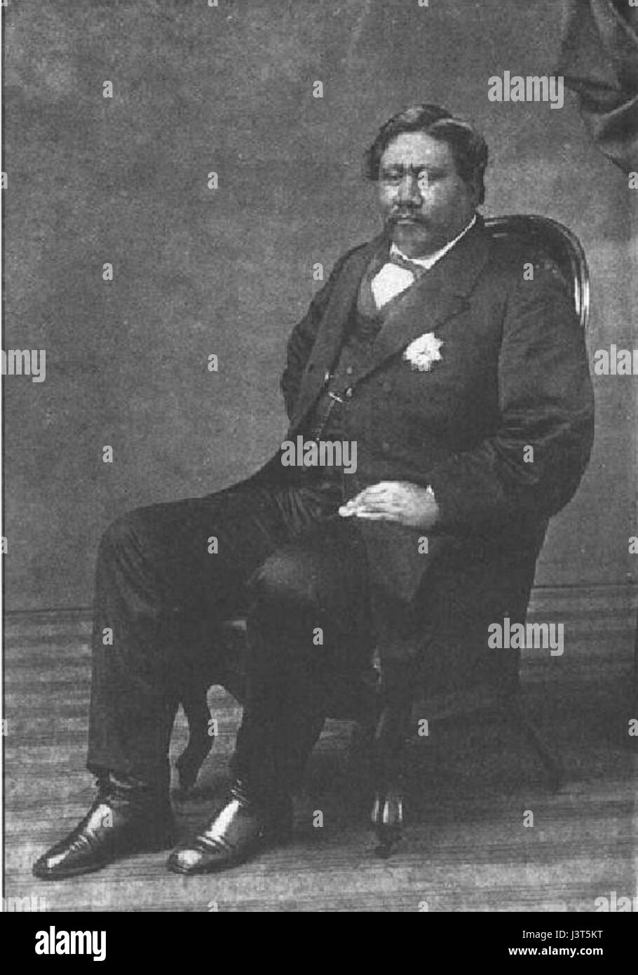 King Kamehameha V, a monarch of Hawaii, is depicted seated in a formal ...